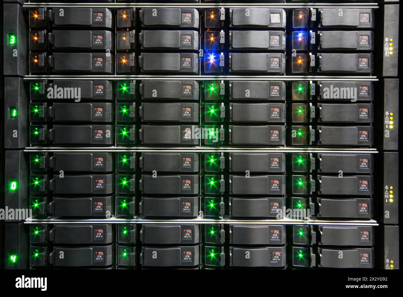 Server rack with multiple hard drives Stock Photo - Alamy