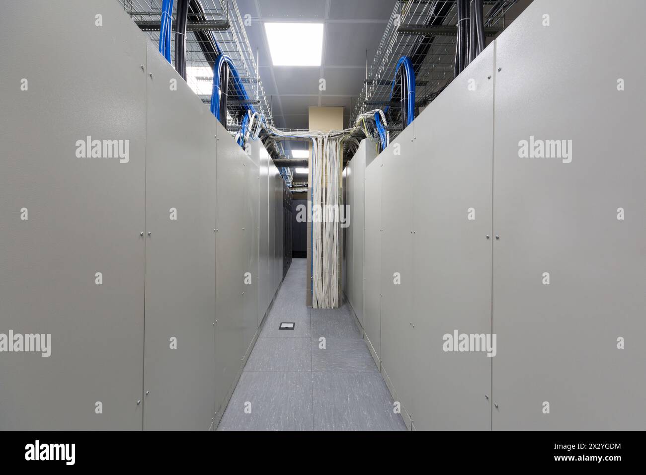 The reverse side of telecommunication racks with lots of cables Stock ...