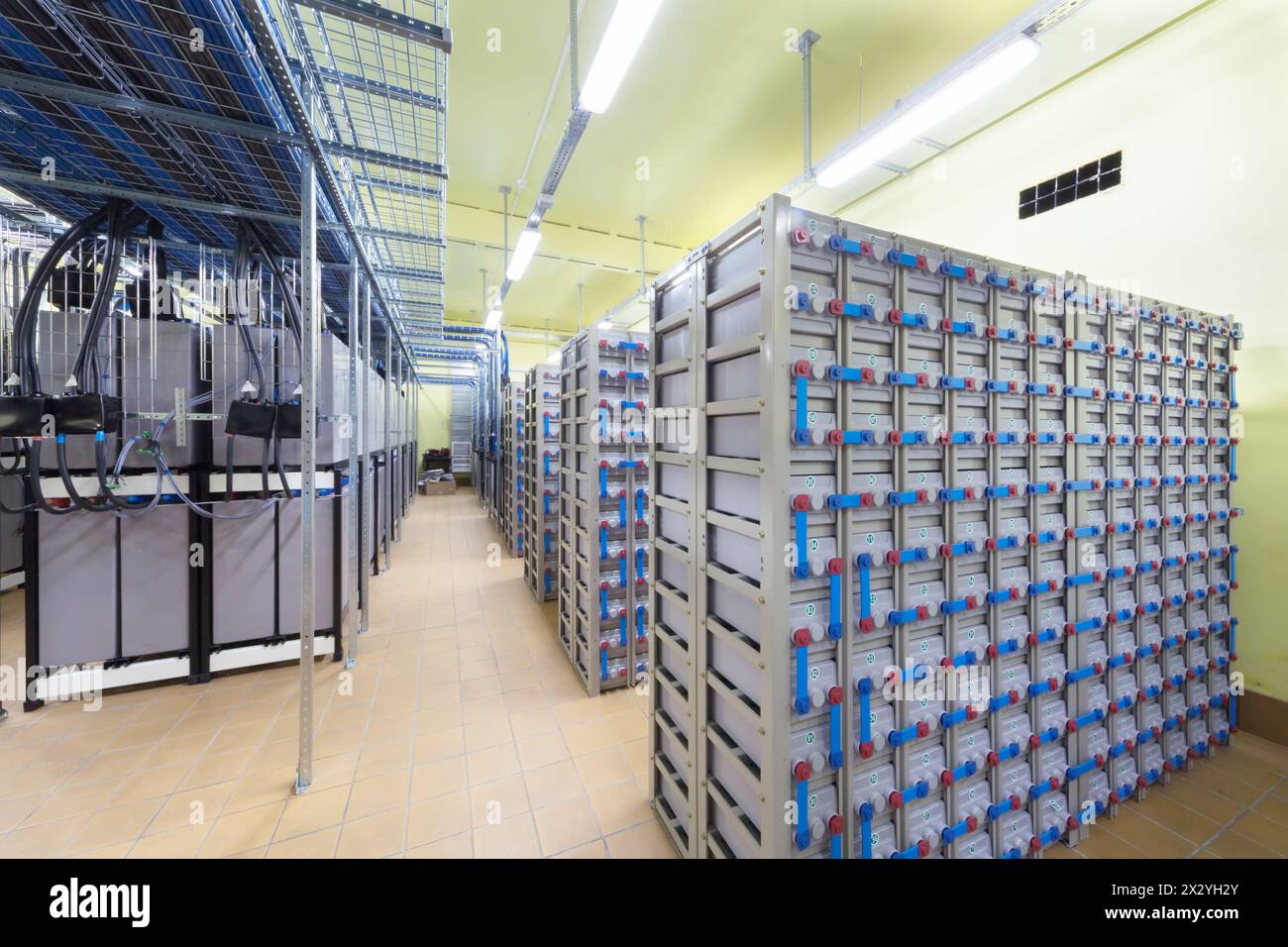Room with many cables and backup power system Stock Photo - Alamy