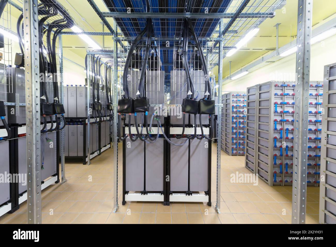Room with many cables and many batteries Stock Photo - Alamy