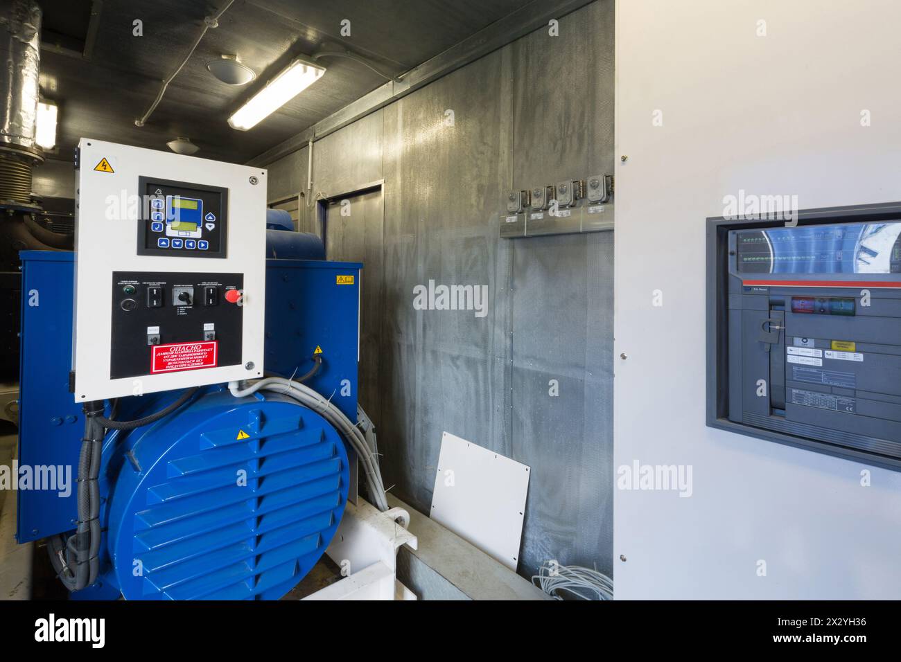 Large industrial diesel generator for backup power with control panel ...