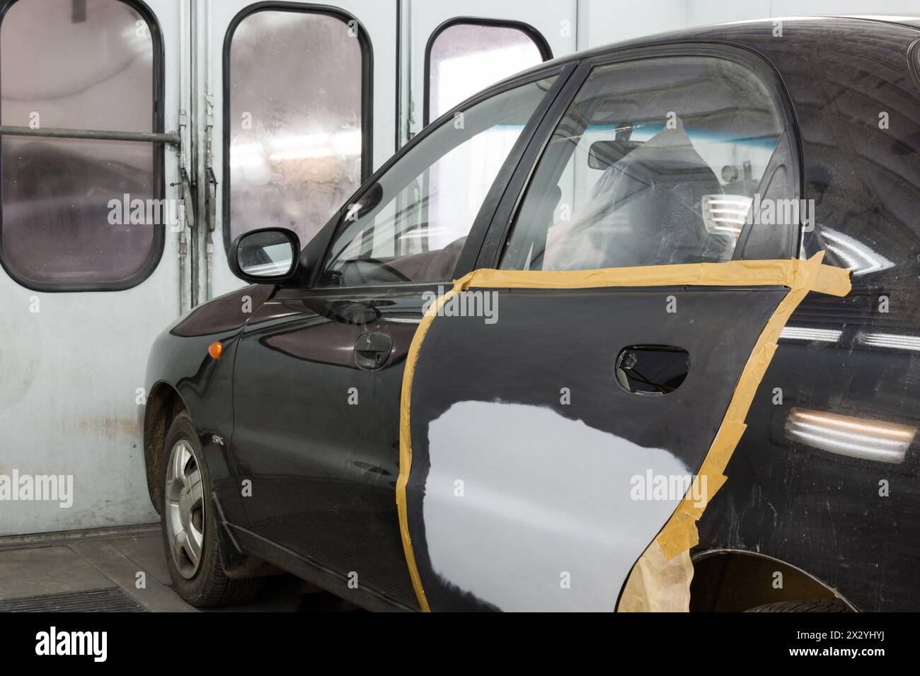 MOSCOW - SEP 21: Preparing the car for painting on body shop ...