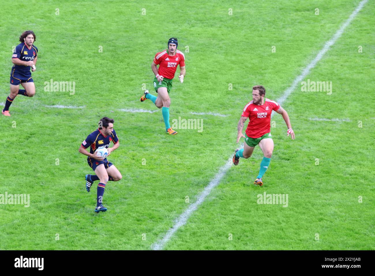 MOSCOW - JUNE 30: Rugby players run at fighting for ball on second ...