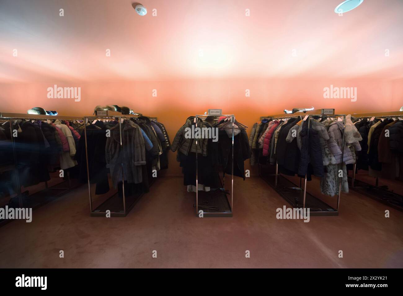 Wardrobe with rows of different clothes Stock Photo - Alamy