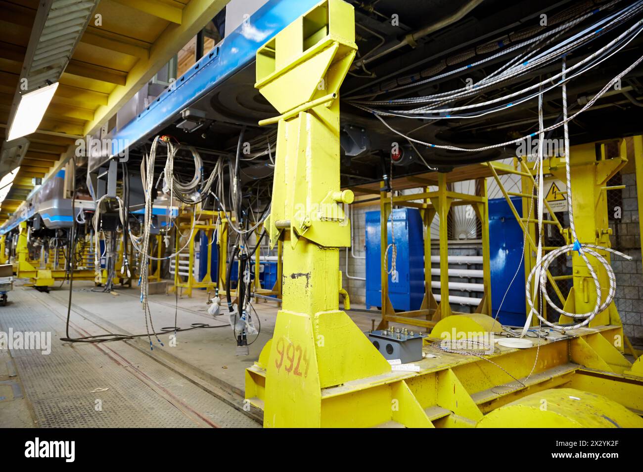 MYTISHCHI - APR 18: To-be assembled cars on jacks in shop floor at ...