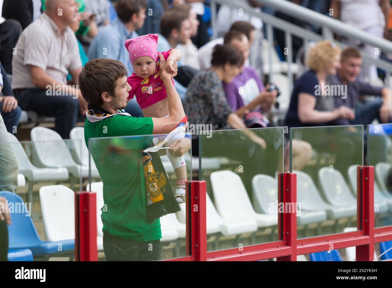 MOSCOW - AUG 15: Father and daughter are fans of a football team at the ...