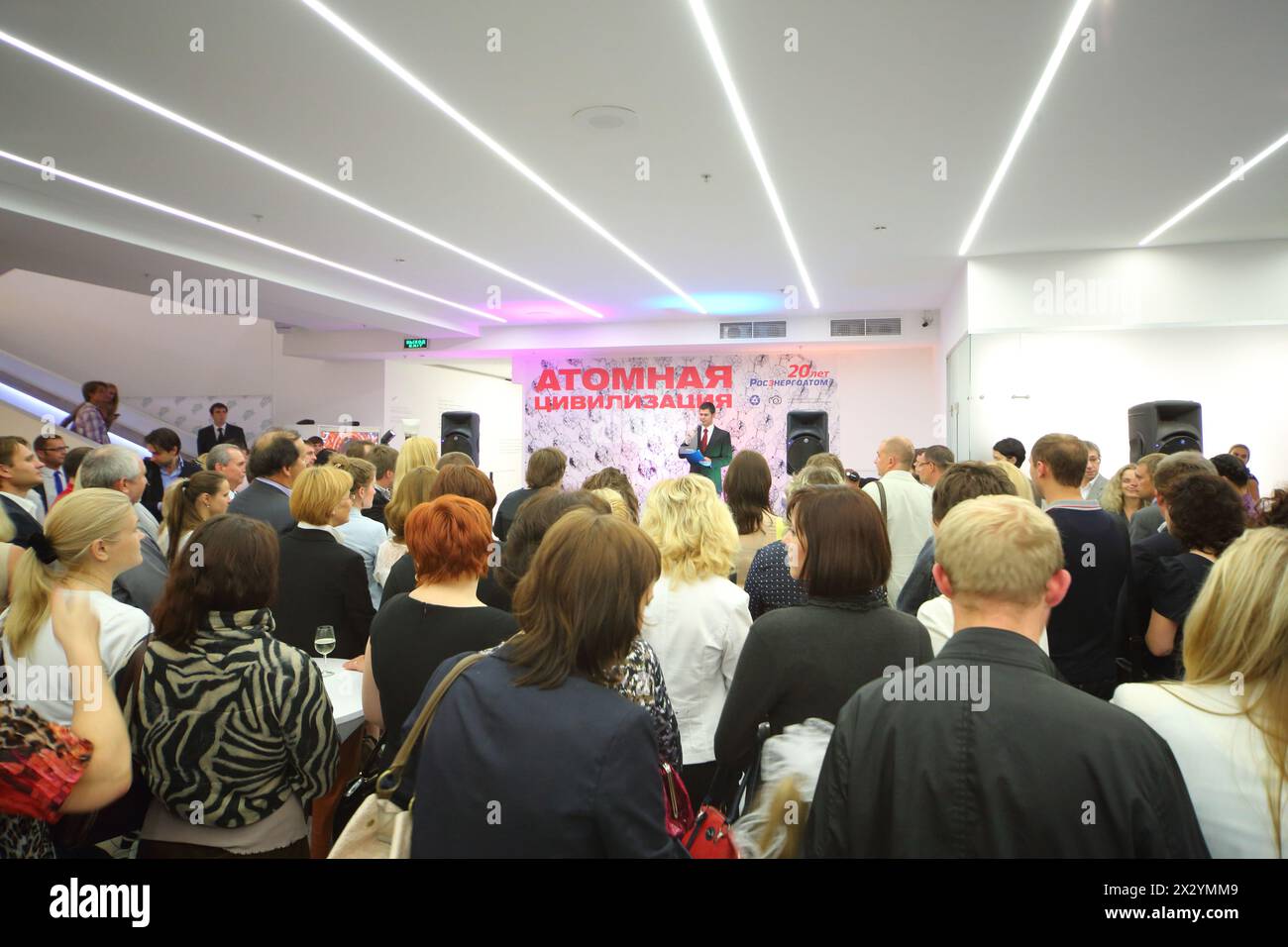 Woman watching presentation moscow public hi-res stock photography and ...