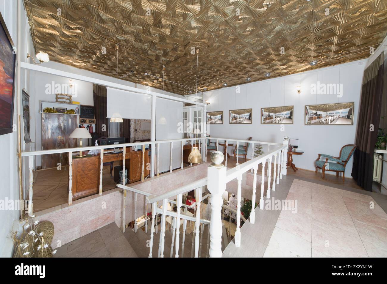 The interior corridor with chairs, staircase and parquet flooring Stock ...