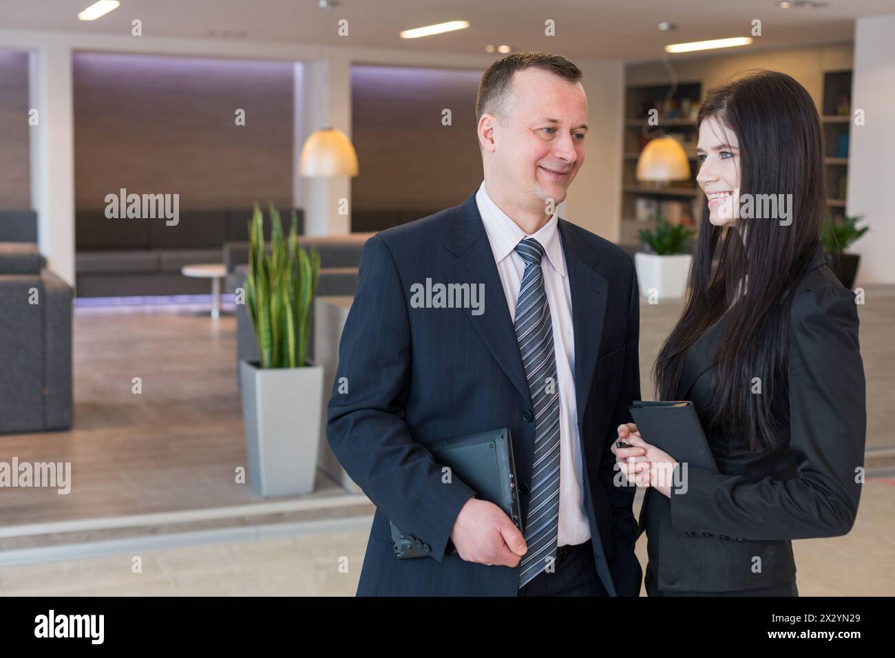 Smart business executives in suits hi-res stock photography and images ...