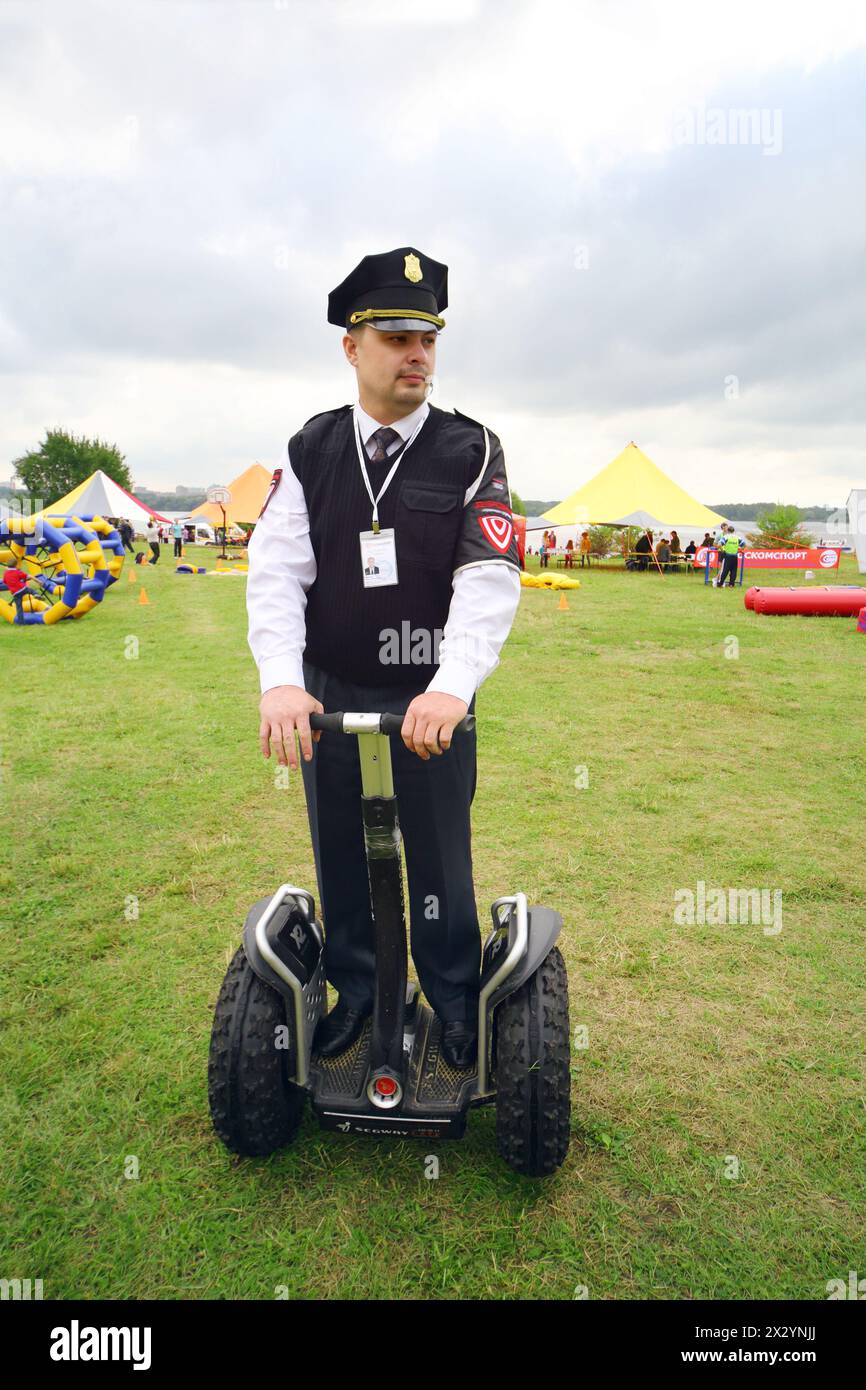 Security guard on segway in hi-res stock photography and images - Alamy