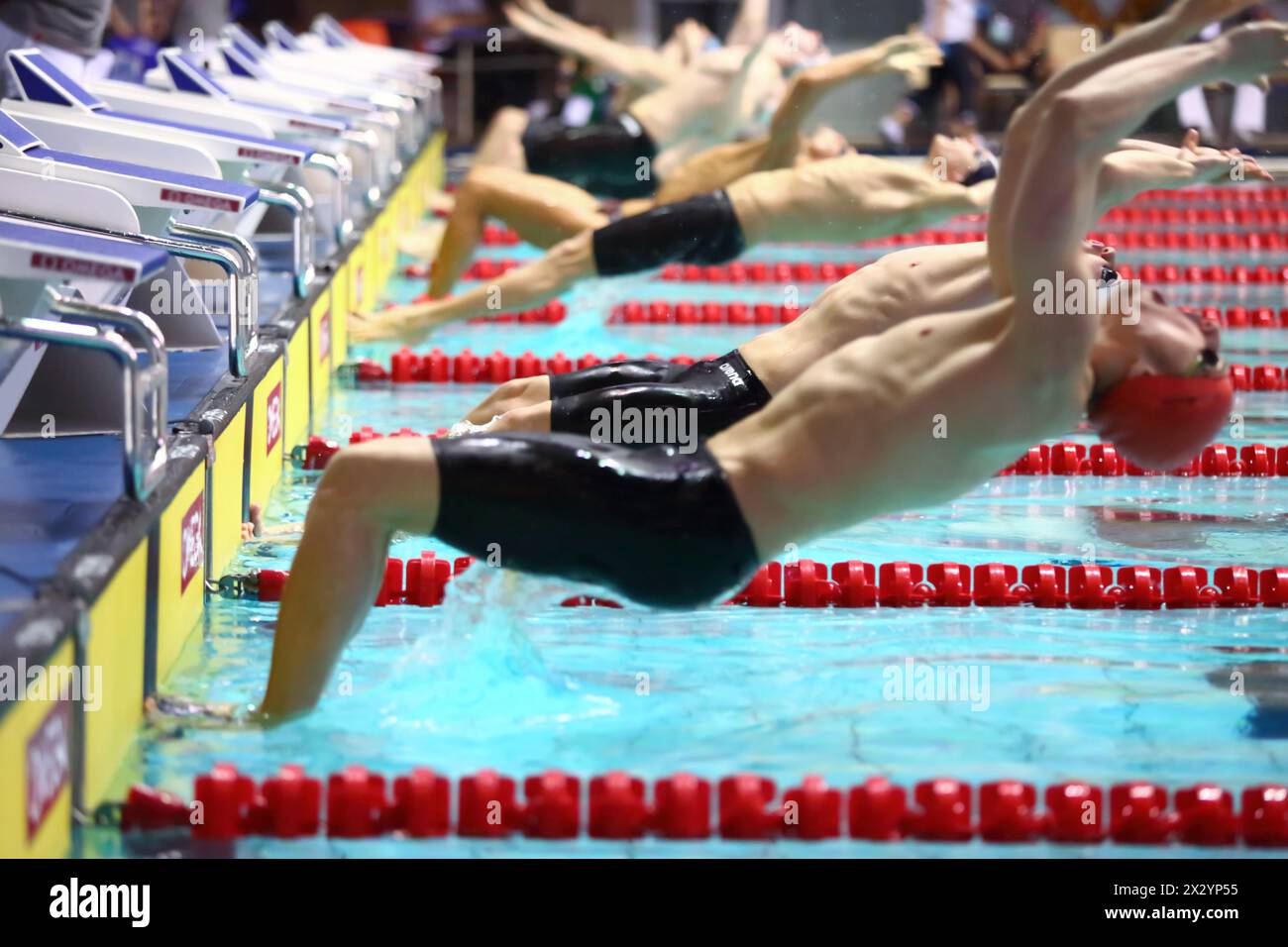 MOSCOW - APR 20: Men at the start of jumping into the water in the pool ...