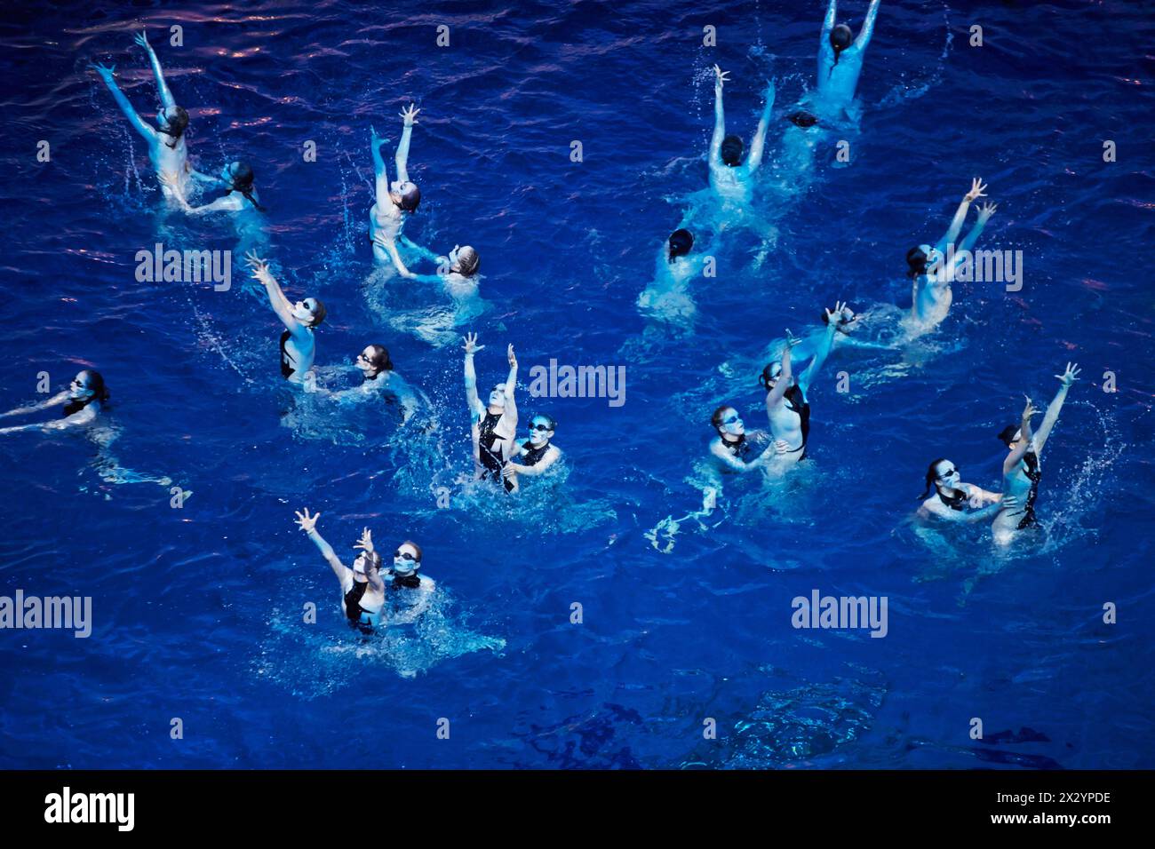 MOSCOW - JAN 4: Synchronized swimmers team performs in Swimming Pool of ...