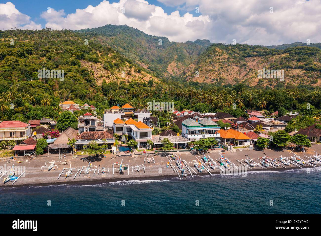 Amed, Bali: Aerial view of the Amed village with its beach lined with ...