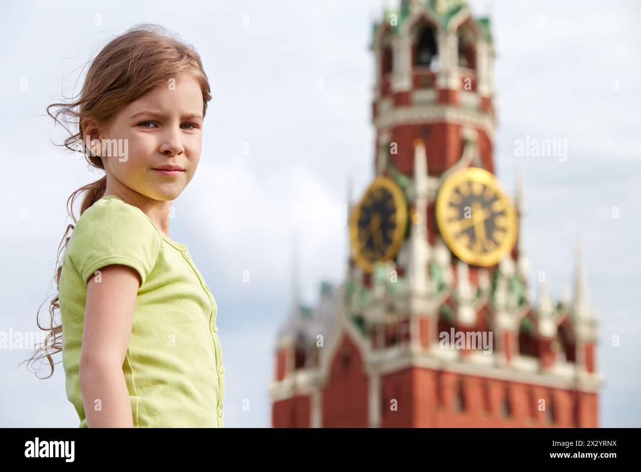 Portrait of girl against Spassky tower of Moscow Kremlin Stock Photo ...