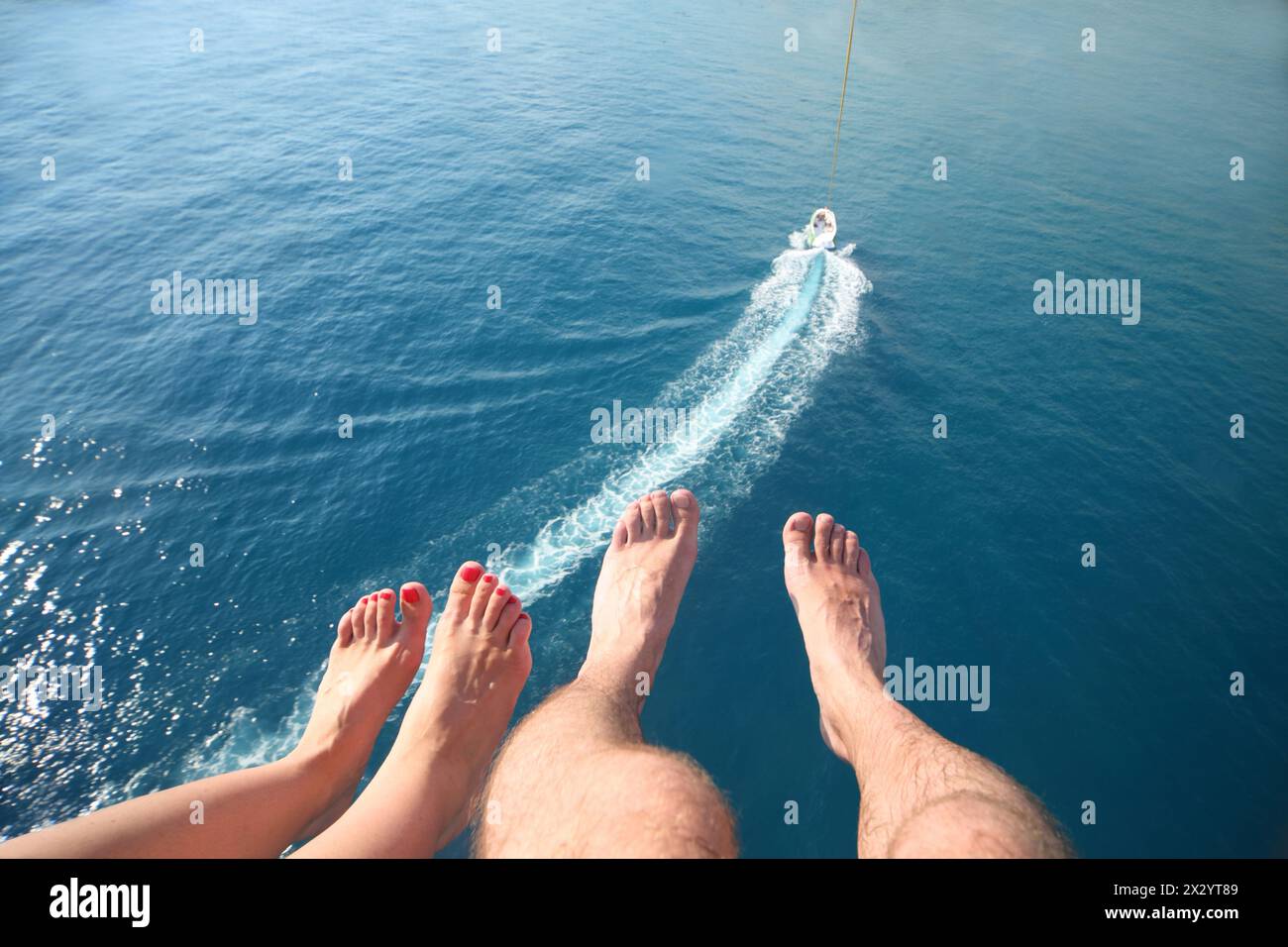 Four legs against the sea and the boat is bound to parachute Stock ...