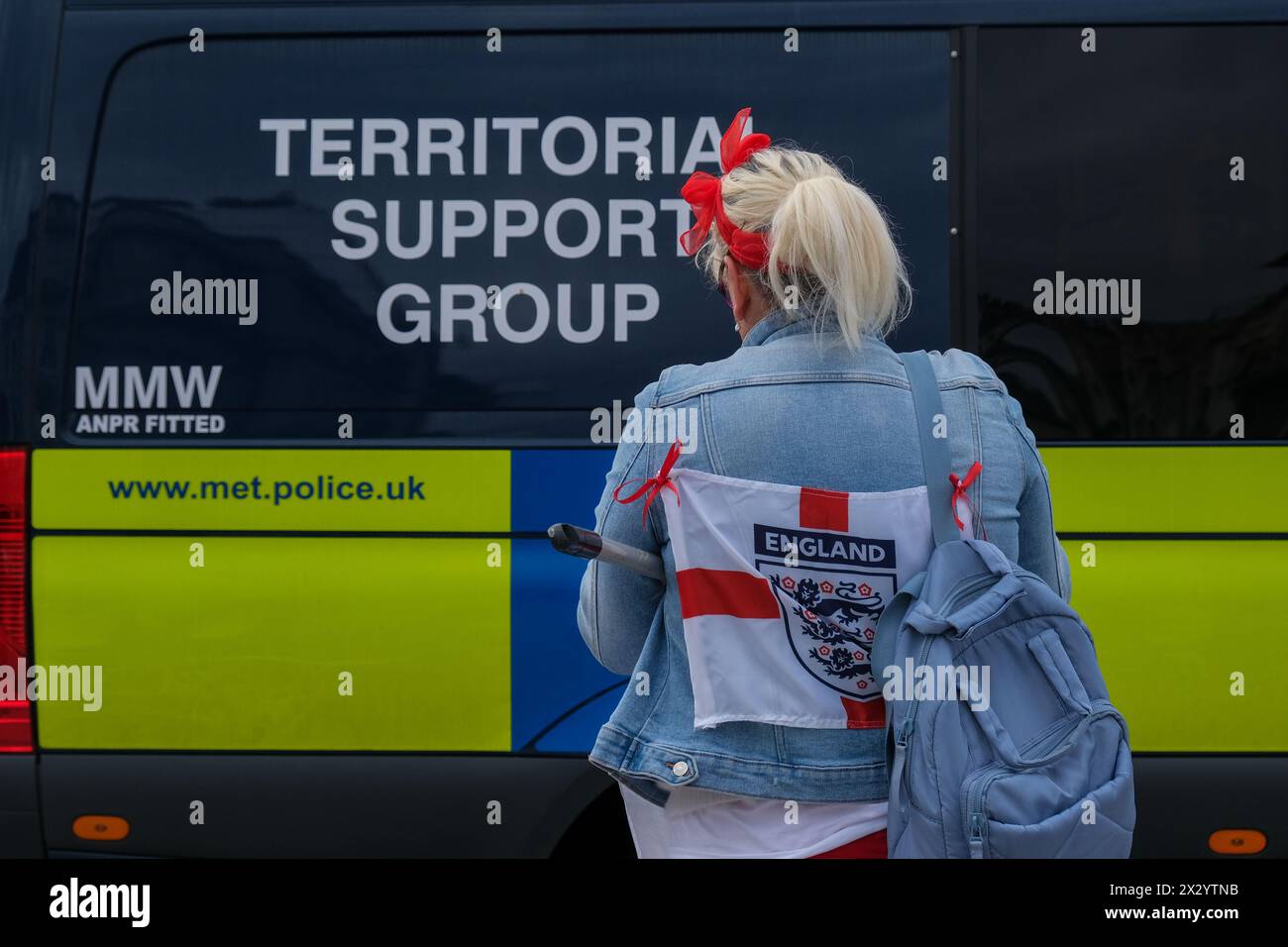 London, UK, 23rd April, 2024. A woman with an England football flag ...