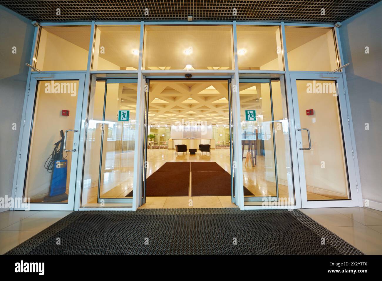 Entrance door to reception hall of office building Stock Photo - Alamy