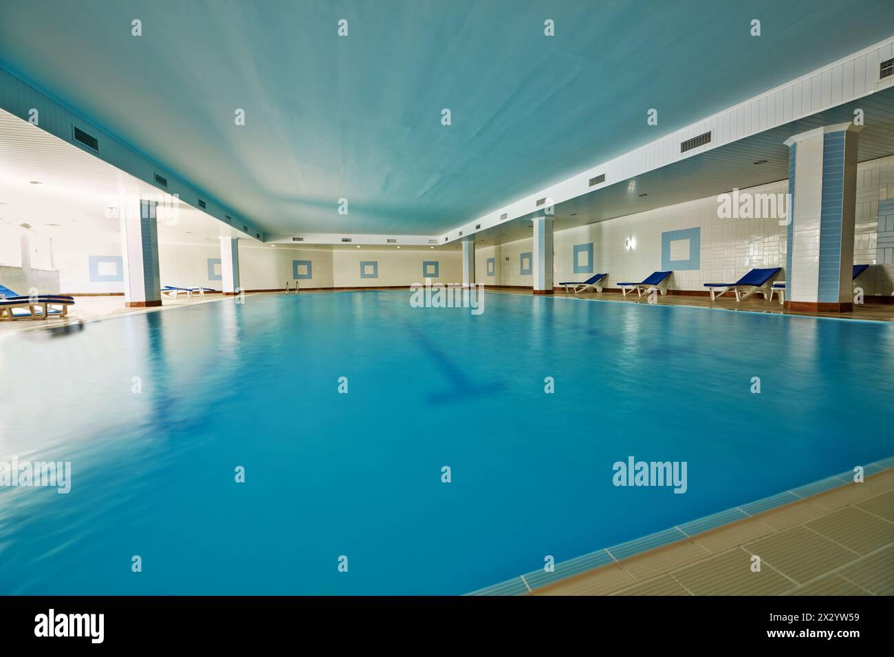 Indoor pool with blue water Stock Photo - Alamy
