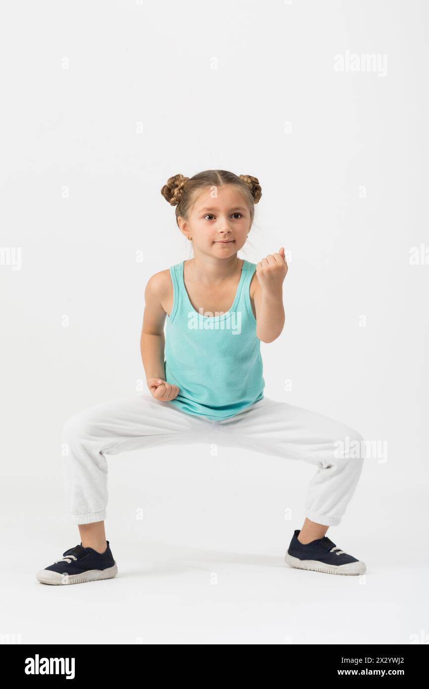 A girl standing in a fighting stance Stock Photo - Alamy