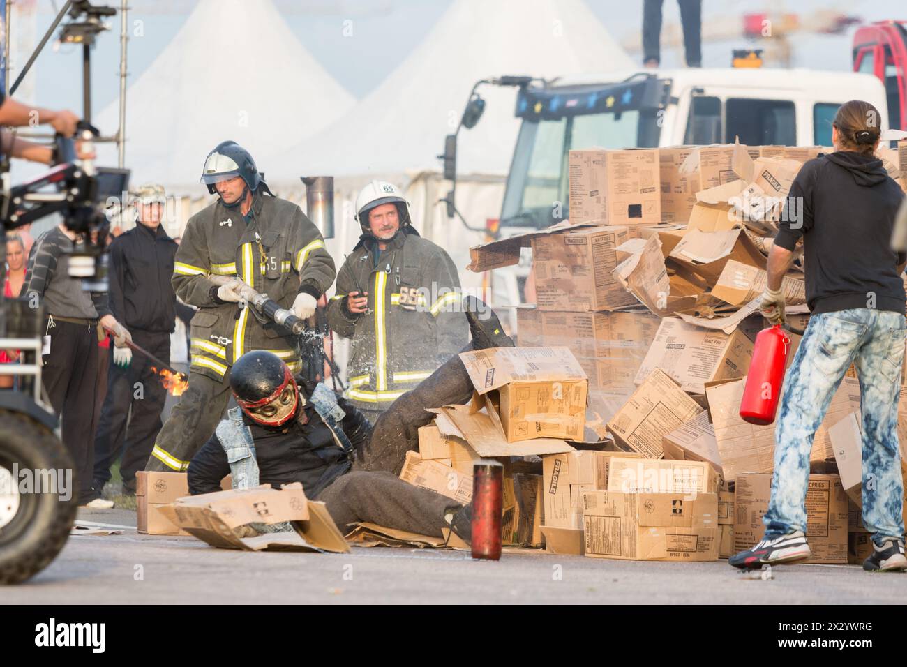 MOSCOW - AUG 25: Rescue workers help a person after jumping from a ...