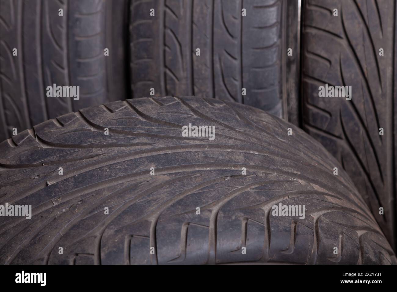 Automobile composition made up stack of tires and wheel with shiny disc ...