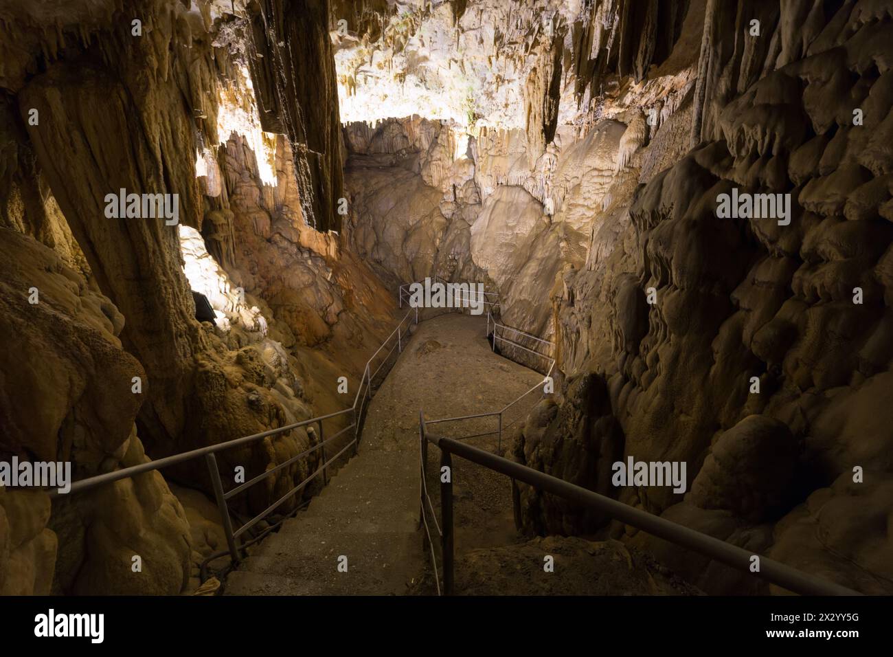 Stairs leading down into the cave Stock Photo - Alamy