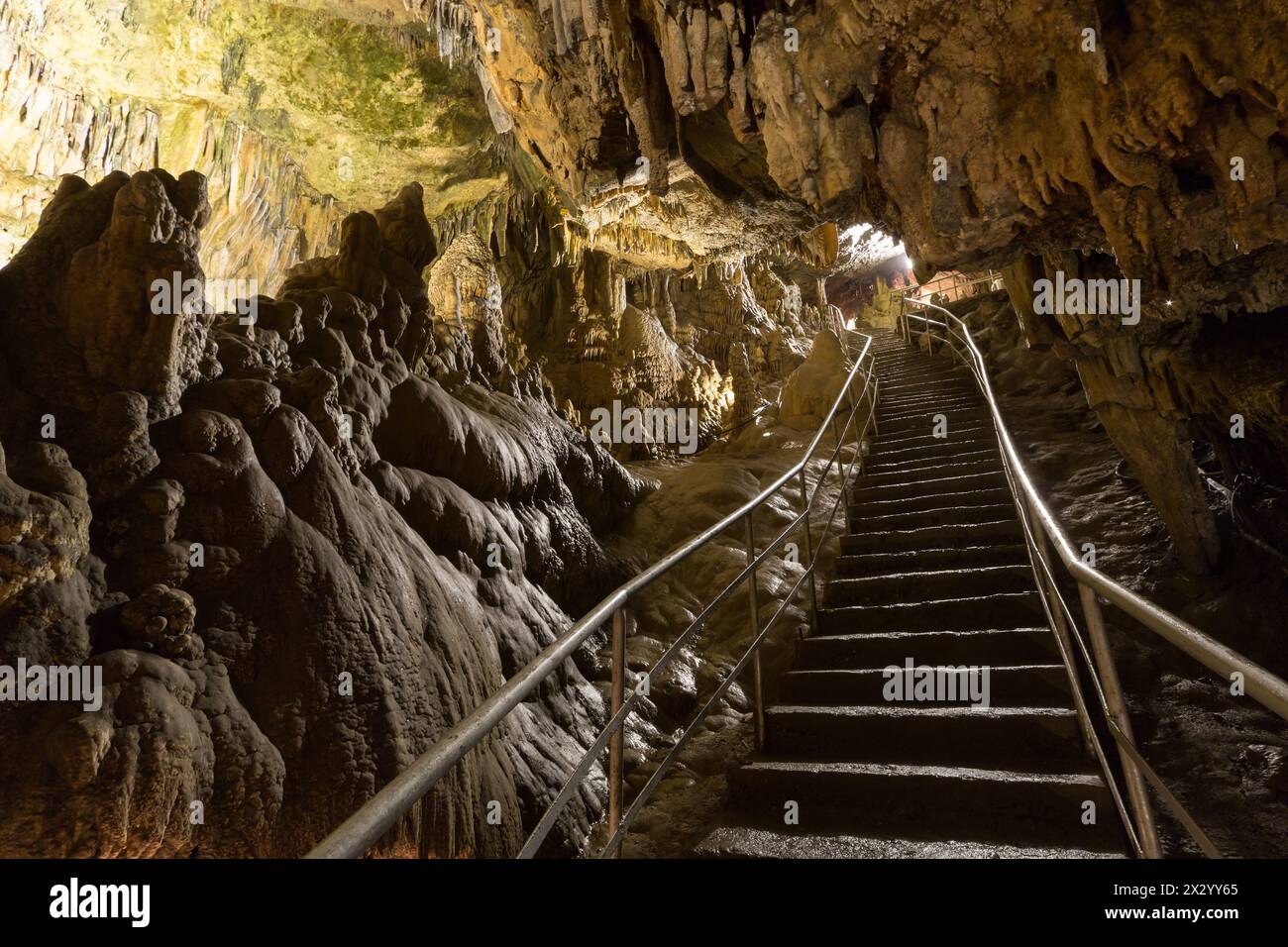 A long staircase leading to the entrance of the cave Stock Photo - Alamy