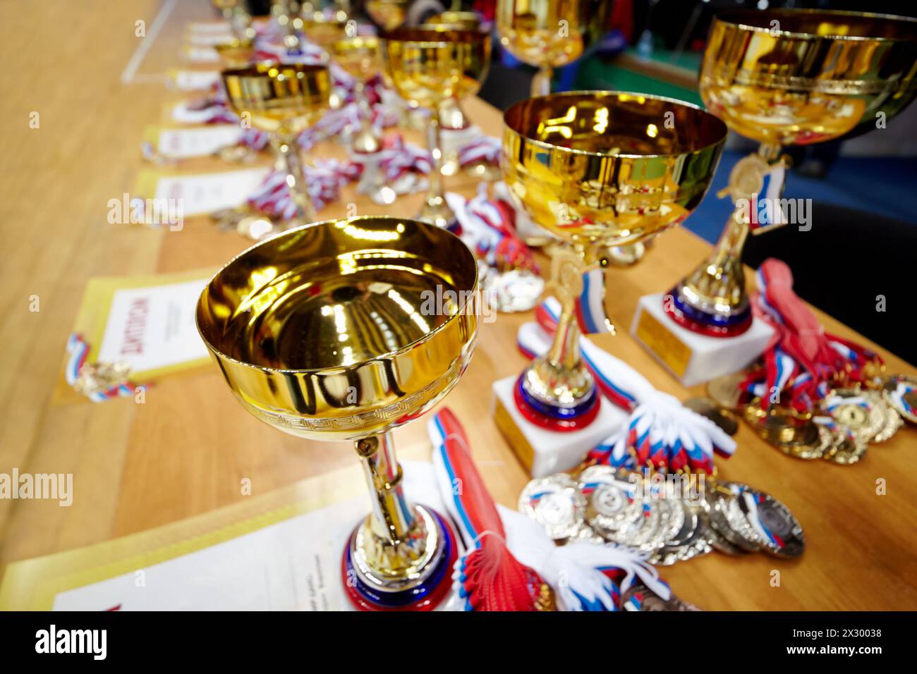 Many award diplomas, cups and medals Stock Photo - Alamy