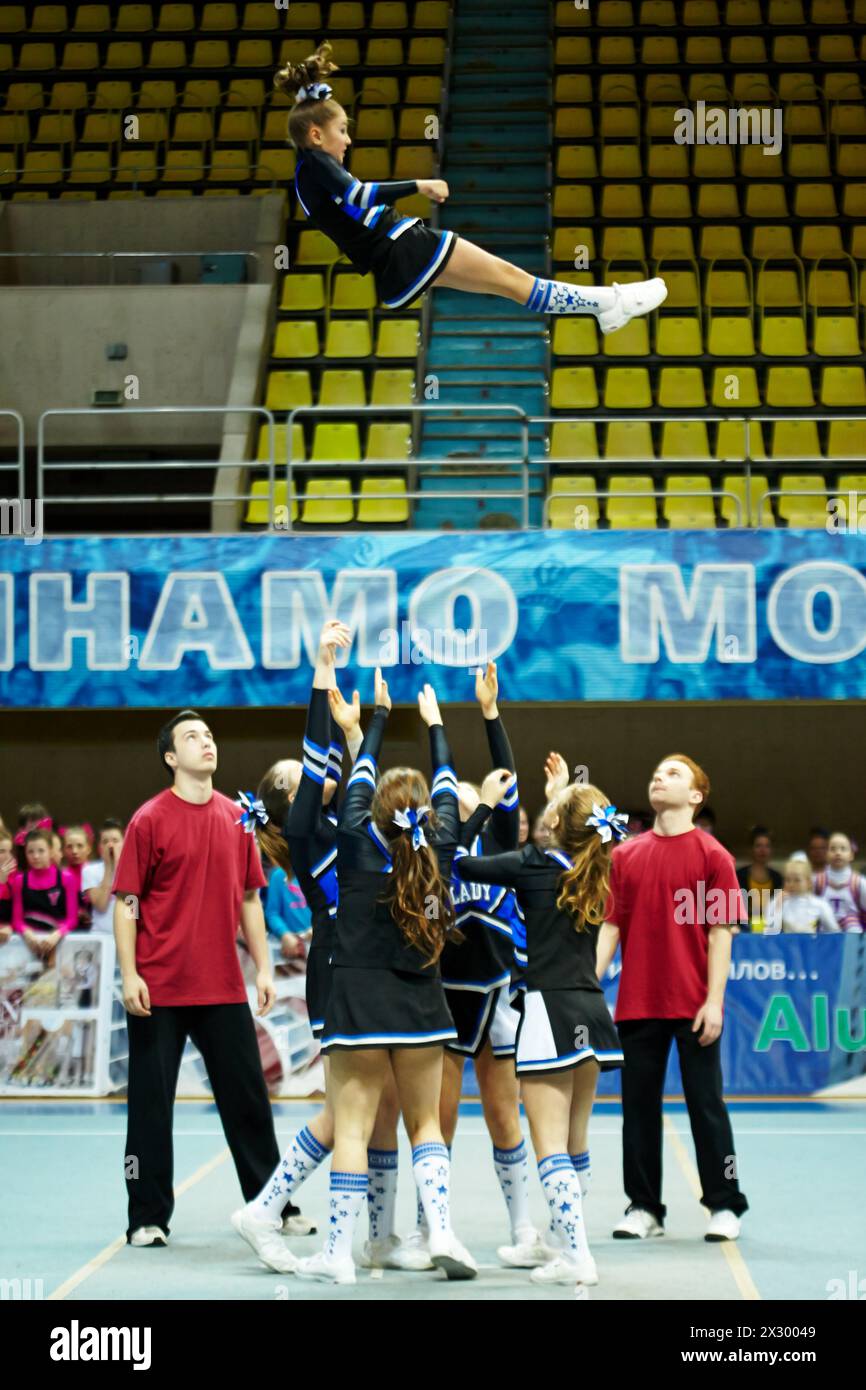 MOSCOW - MAR 24: Cheerleaders girl team Lady performs acrobatics at ...