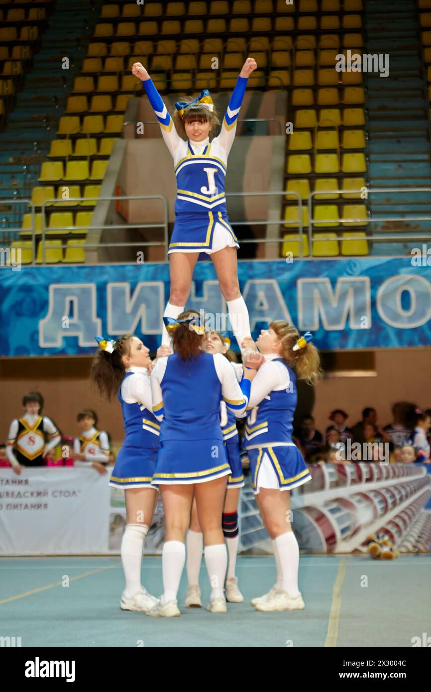 MOSCOW - MAR 24: Girl from cheerleaders team Jam performs stunt at ...