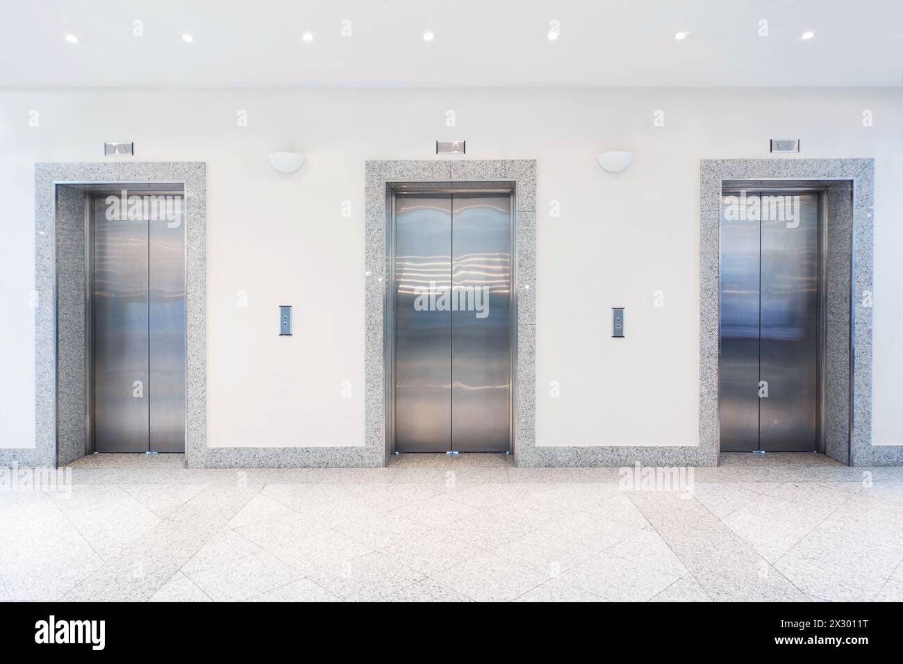 three doors in elevator Stock Photo - Alamy