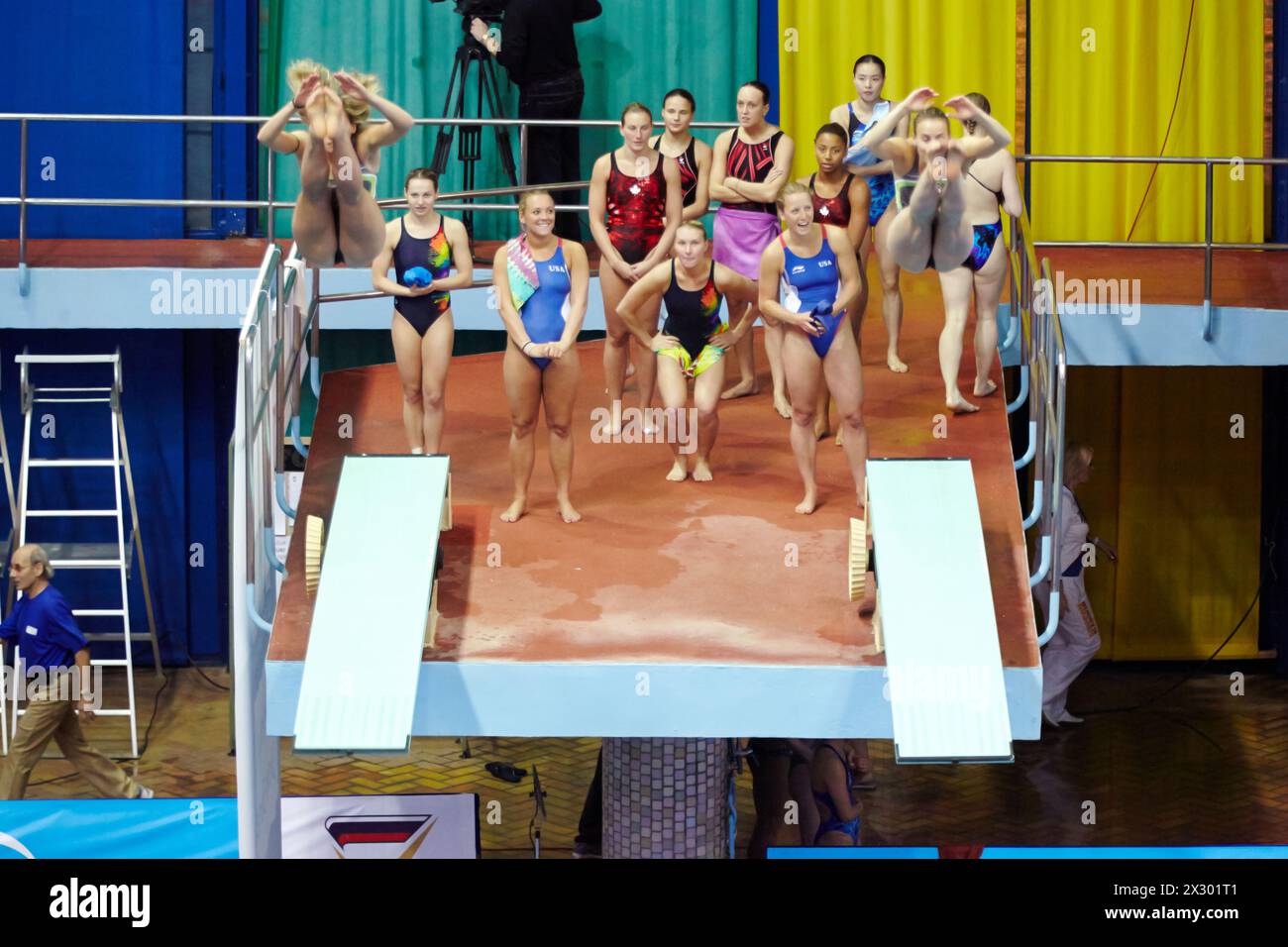 MOSCOW - APR 13: Female athletes perform syncronized jump in Pool of SC ...