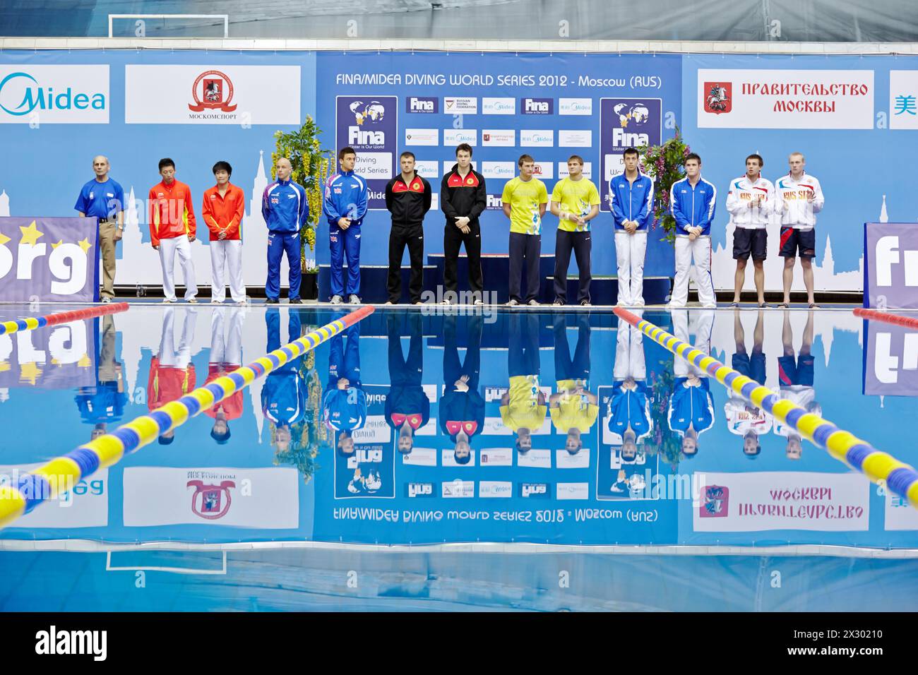 MOSCOW - APR 13: Athletes stand near to victory podium before awarding ...