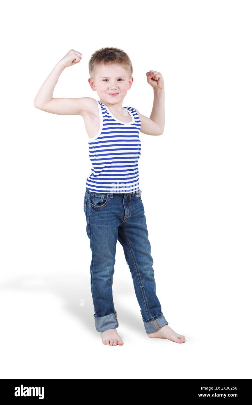 Smiling boy strains biceps and shows how strong he is Stock Photo - Alamy