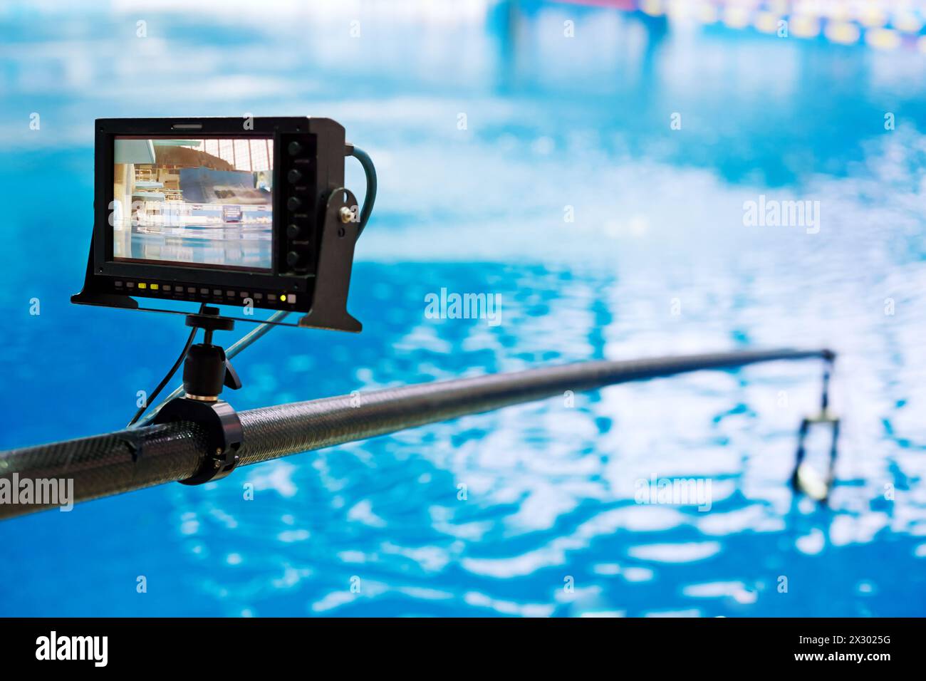 Portable multiformat LCD monitor, mounted on rod for shooting jumps ...
