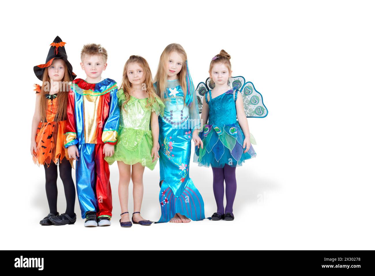 Children in carnival costumes stand in line with serious faces Stock ...