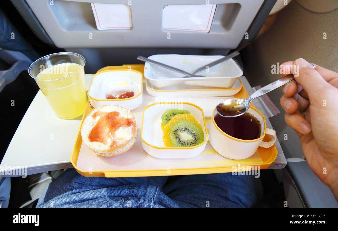 Breakfast in plane fruit hi-res stock photography and images - Alamy
