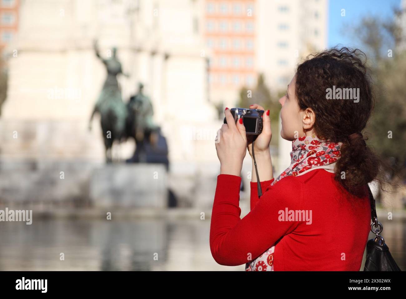 MADRID - MARCH 9: Woman photographs monument to Don Quixote and Sancho ...
