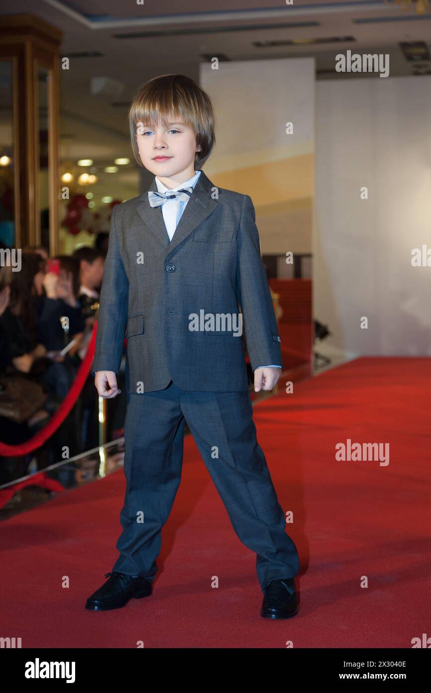 The boy on the runway at a fashion show in a childrens store Stock ...