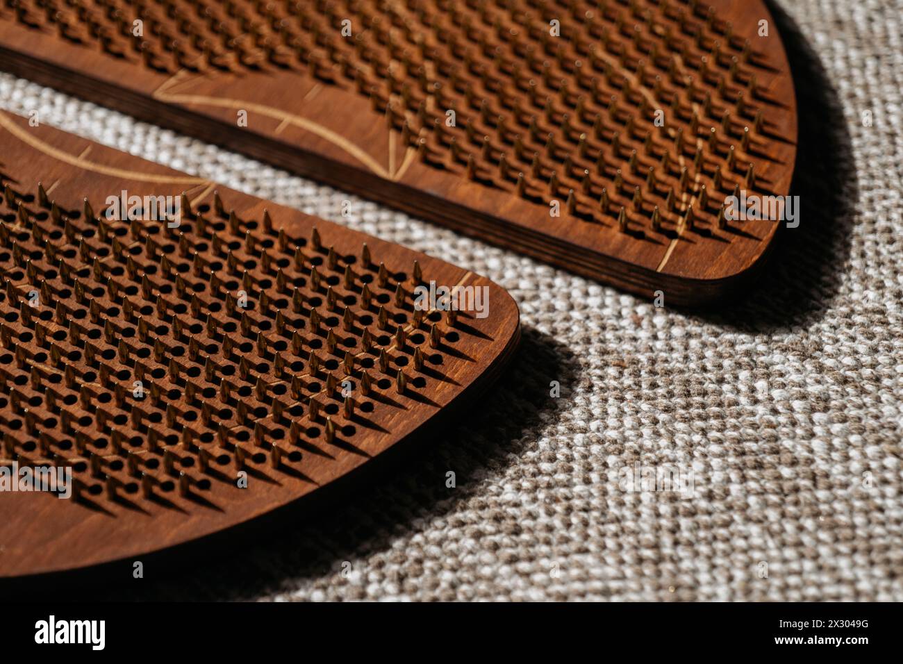 Crafted wooden acupressure sadhu boards with intricate peg patterns ...