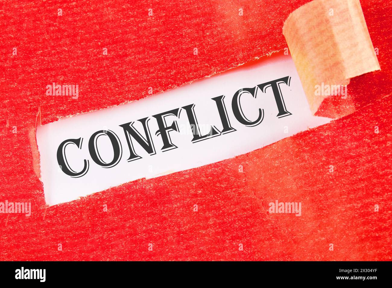 Conflict word on a white background under torn paper Stock Photo - Alamy