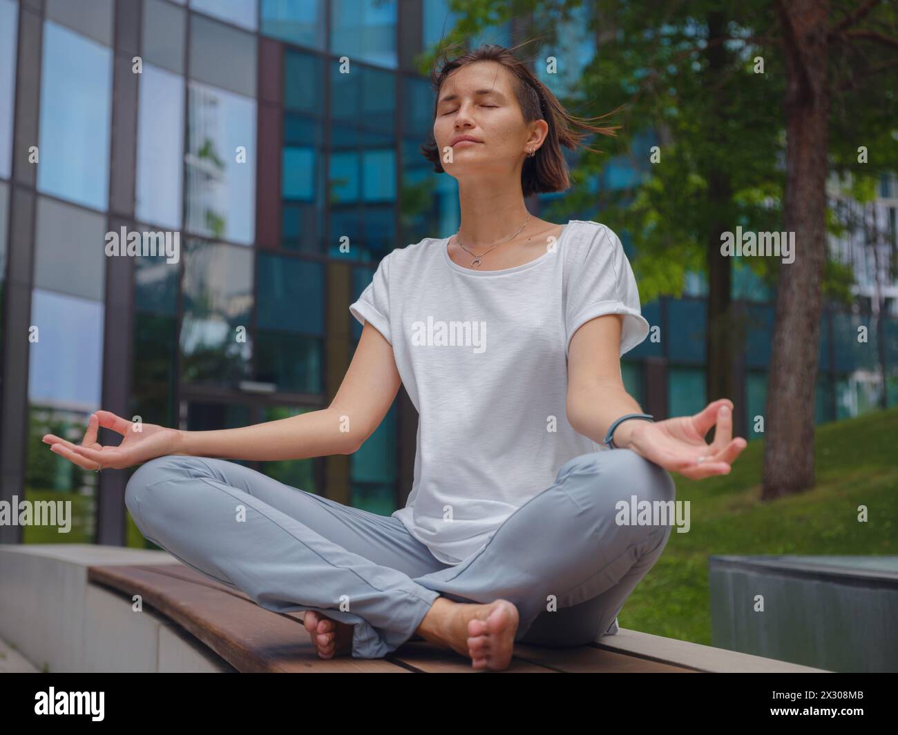 De-stress, unwind idea. peaceful female freelance employee practicing ...