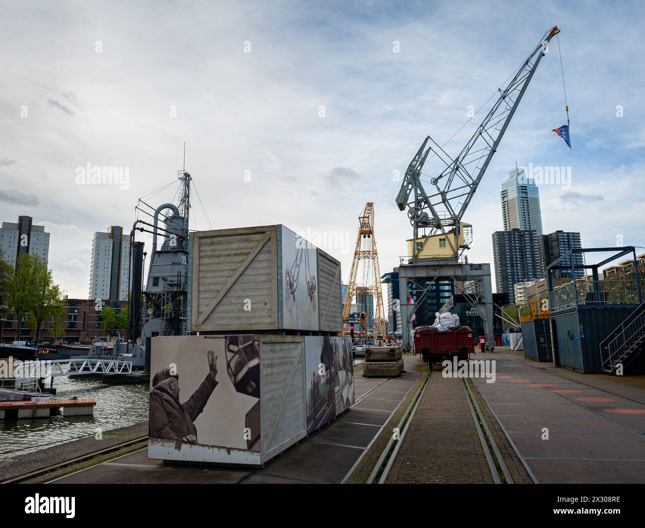 Quay with cargo and cranes in open air Maritime Museum in Rotterdam ...