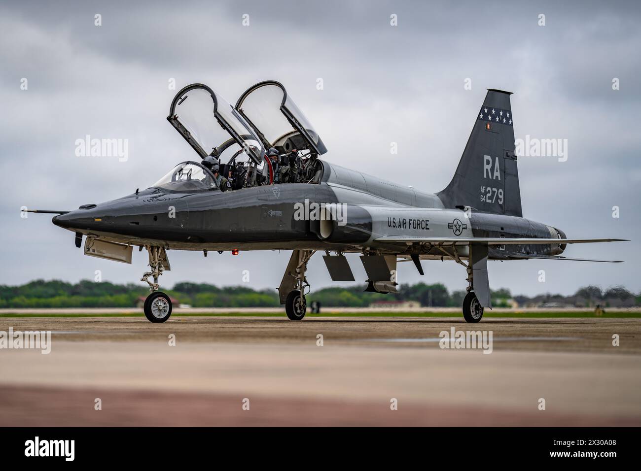 Retired U.S Air Force Capt. Ralph Galati, (rear) waves to friends and ...