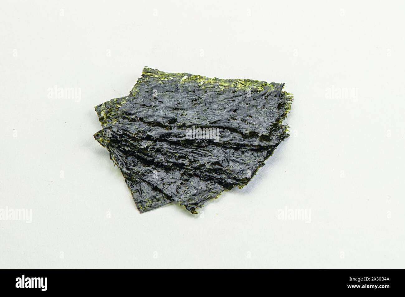 Korean nori seaweed chips heap snack Stock Photo - Alamy