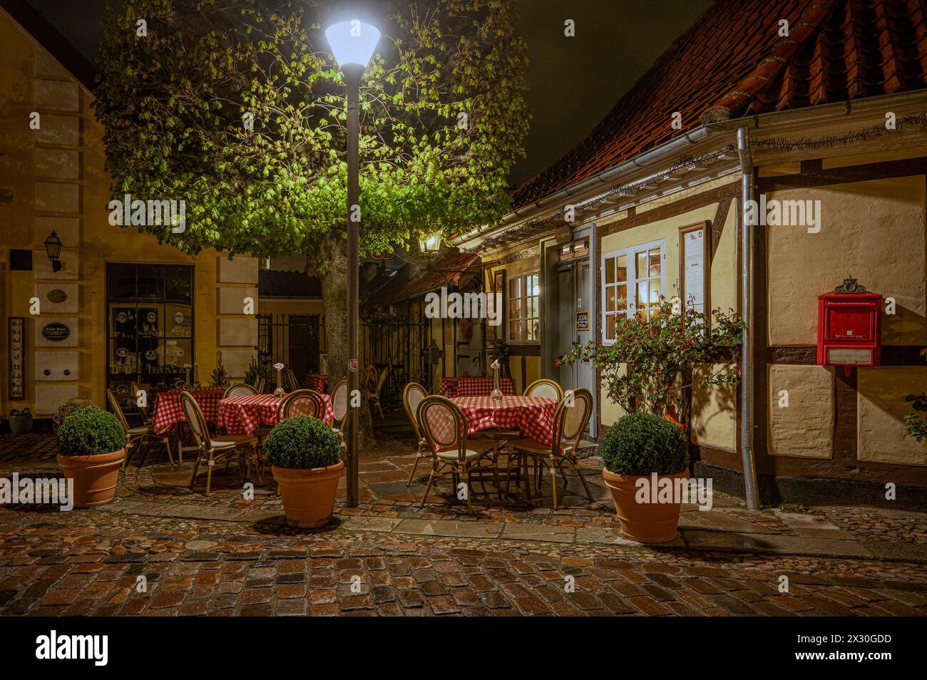 Night scene of the restaurant Under the Linden Tree at H C Andersen´s ...