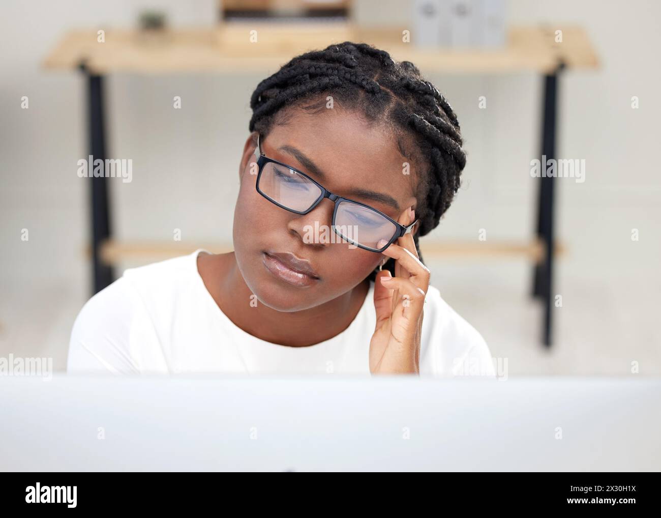 Computer, tired and black woman typing for company, writing and ...