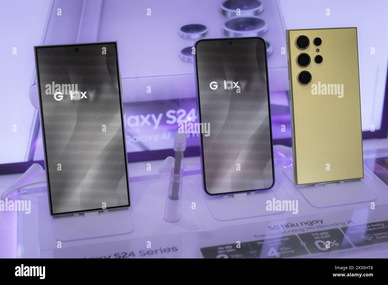 Showcase with smartphones in the modern electronics store. Smartphones ...