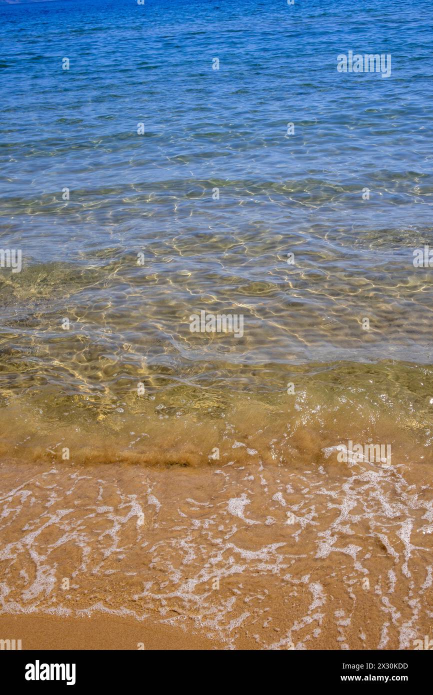 Calm waves meet golden hi-res stock photography and images - Alamy