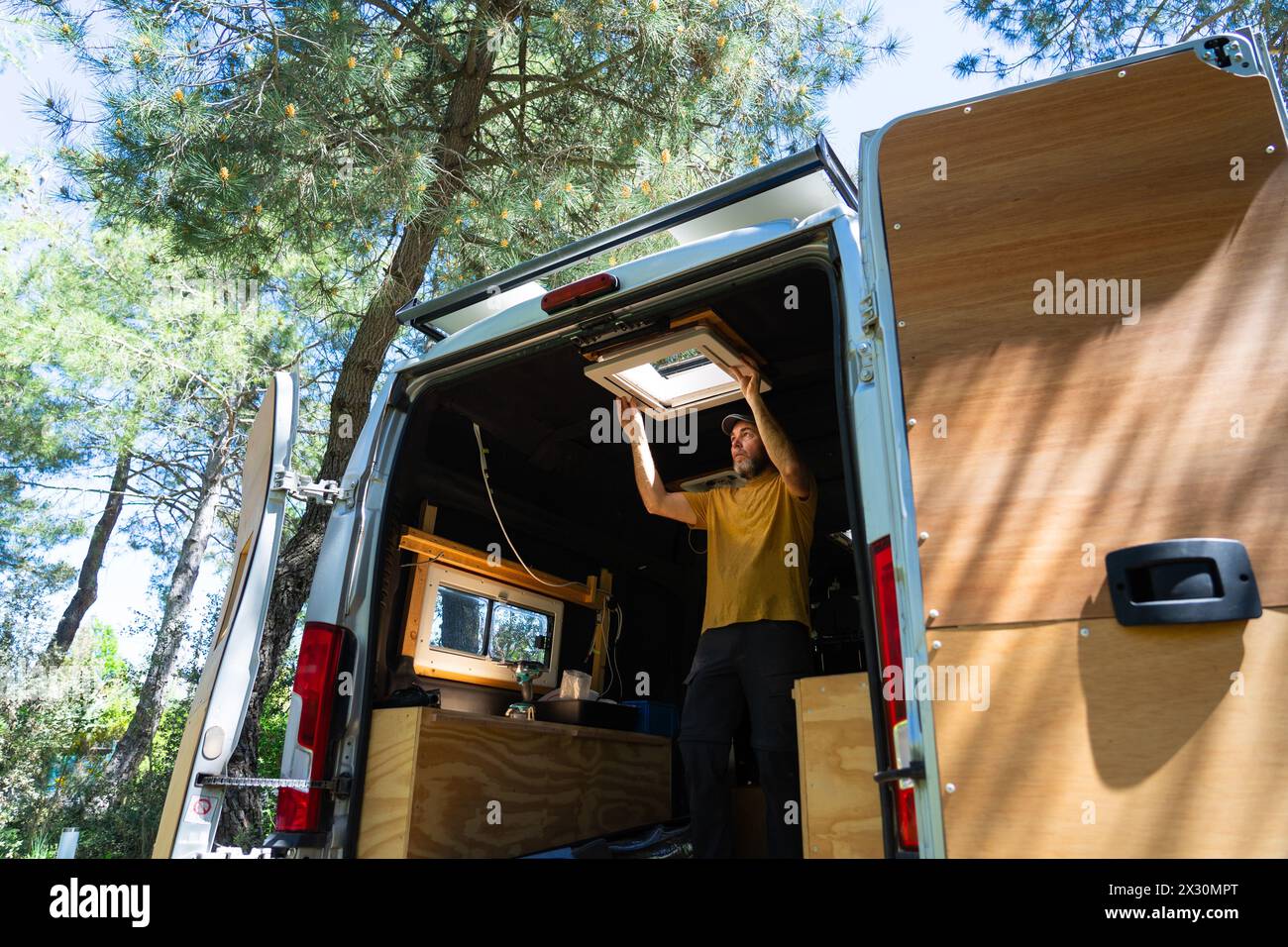 Vanlife man in camper van hi-res stock photography and images - Alamy